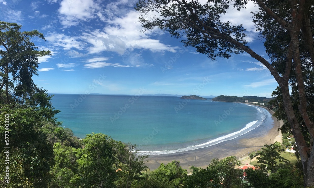 Shot of Jaco Beach in Costa Rica. Photo taken from a hill overlooking ...