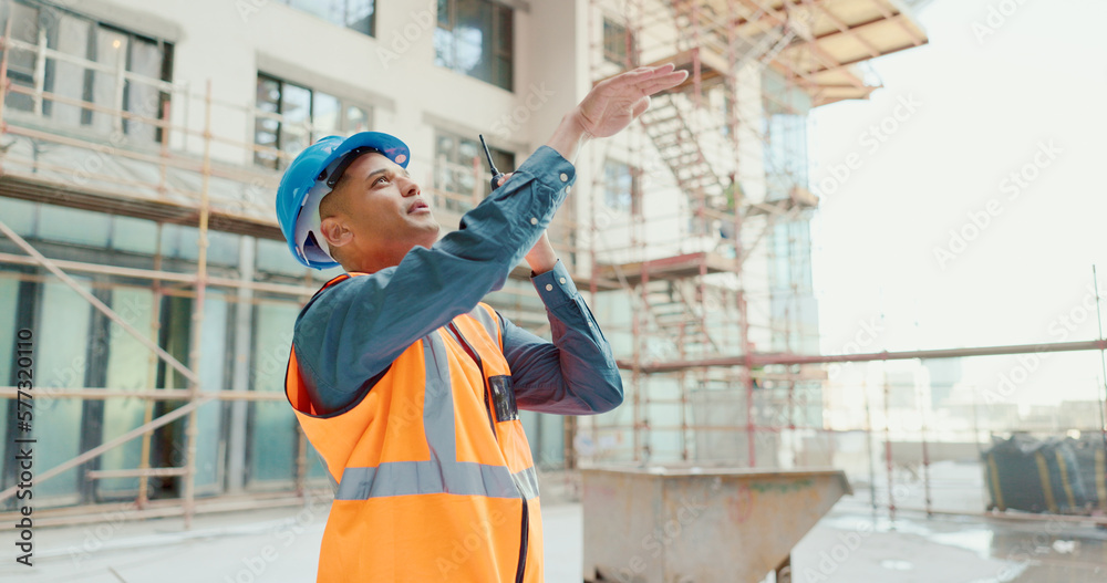Foto de Construction worker, radio communication and building ...