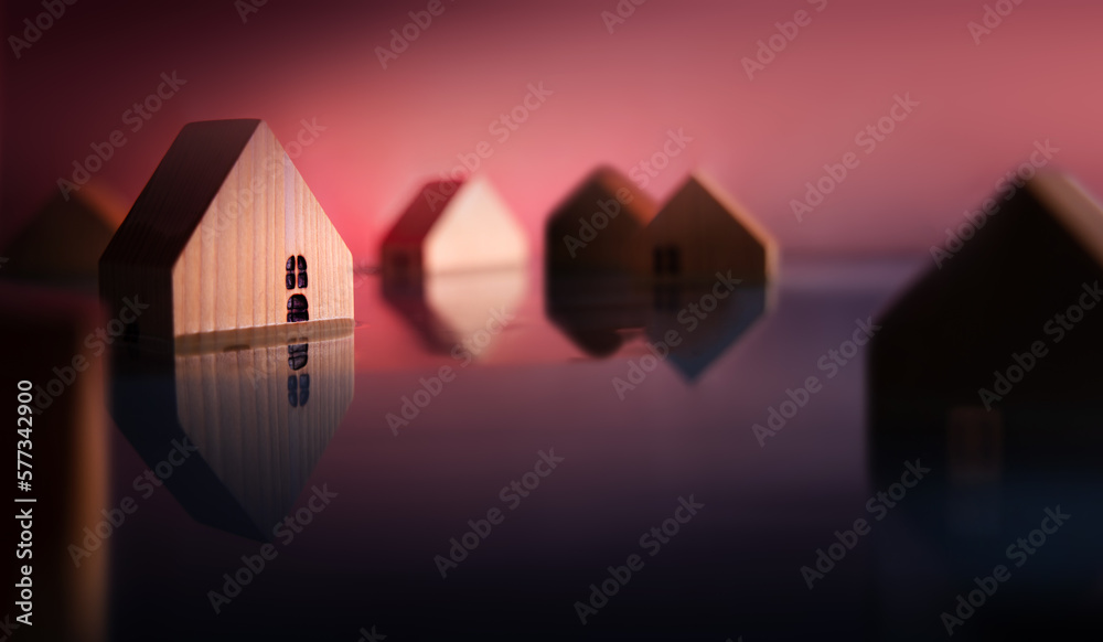 Environment Issue Concept. Wooden Miniature House in Flood ...