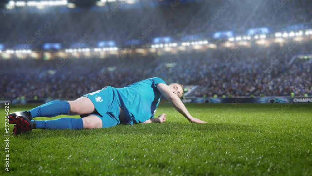 Aesthetic Shot of Blue Team Soccer Football Player Sliding on The Grass ...