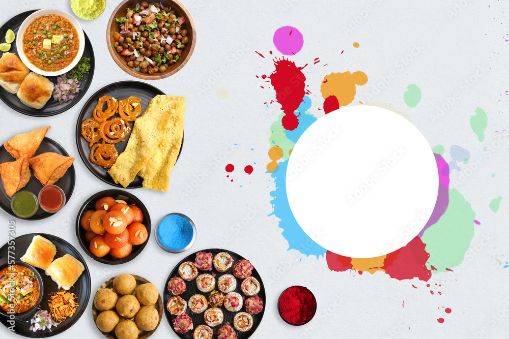 Assorted Indian Holi festival food like samosa, kachori, Puri bhaji ...