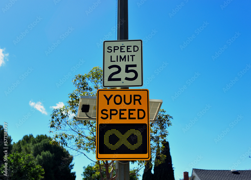 A speed monitoring sign measures excessive speed and displays an ...