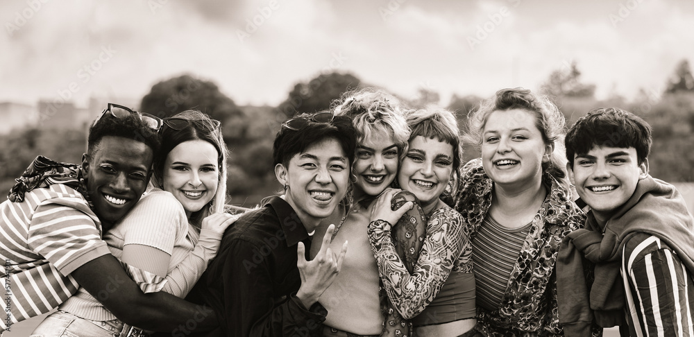 Young multi ethnic friends having fun together hanging out in the city ...