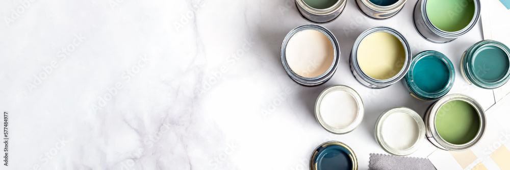 Tiny sample paint cans during house renovation, process of choosing ...
