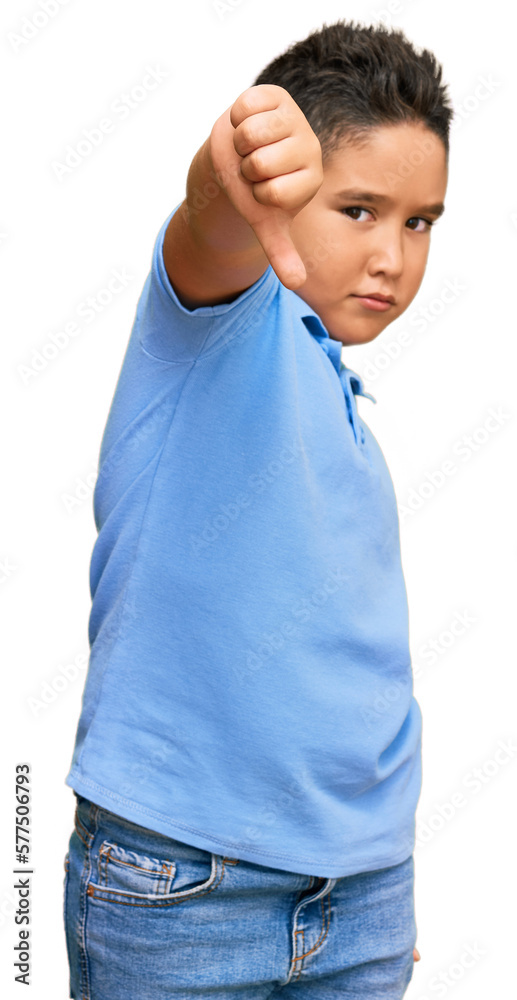 Little boy hispanic kid wearing casual clothes looking unhappy and ...