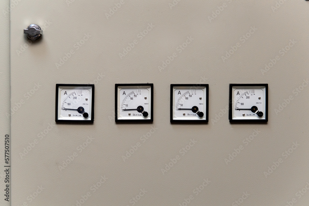 Analog voltmeter, amp meter and signal lamp on control panel of power ...