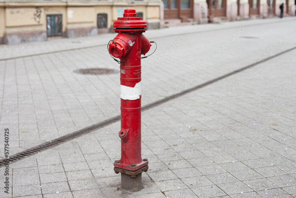 red fire hydrant on the street horizontal photo. fire safety risk ...