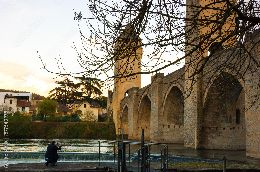 Cahors, France. Tourist (unidetified, back view) taking picture of ...