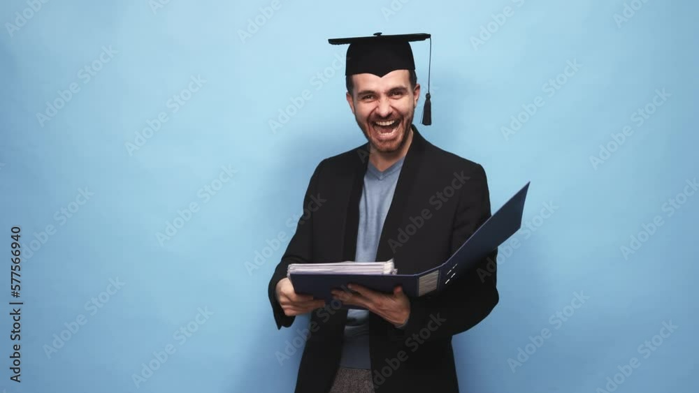 Video Stock Graduation. Happy and excited young man, student in ...