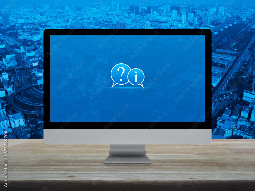 Question mark and information chat icon on desktop computer monitor ...