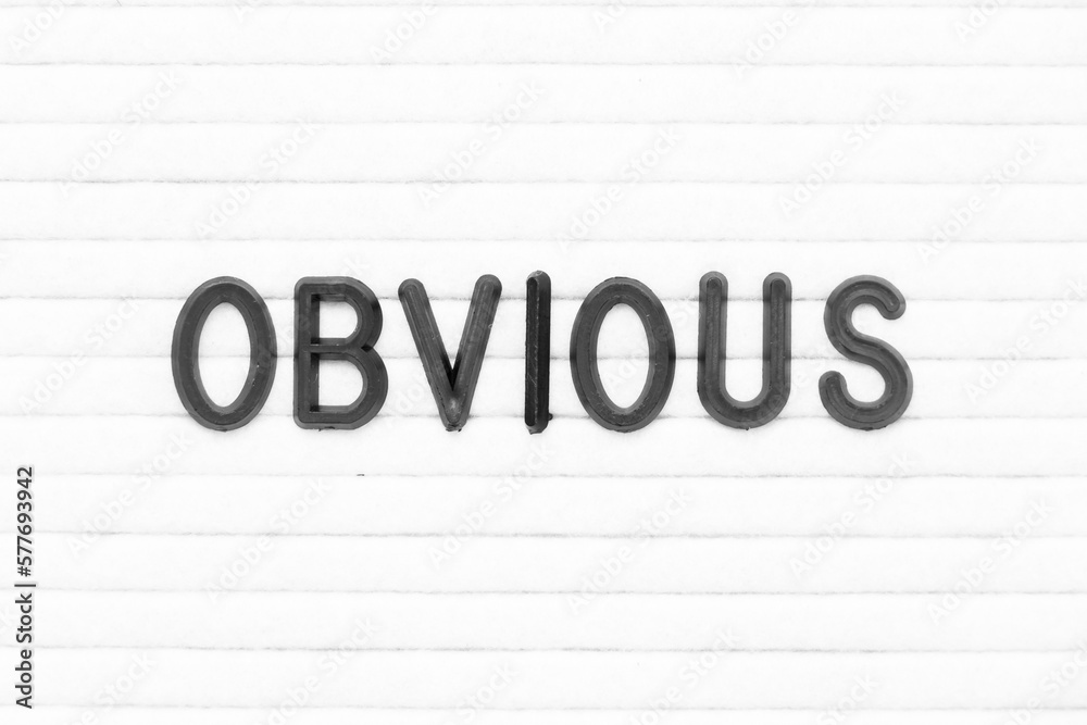 Black color letter in word obvious on white felt board background Stock ...