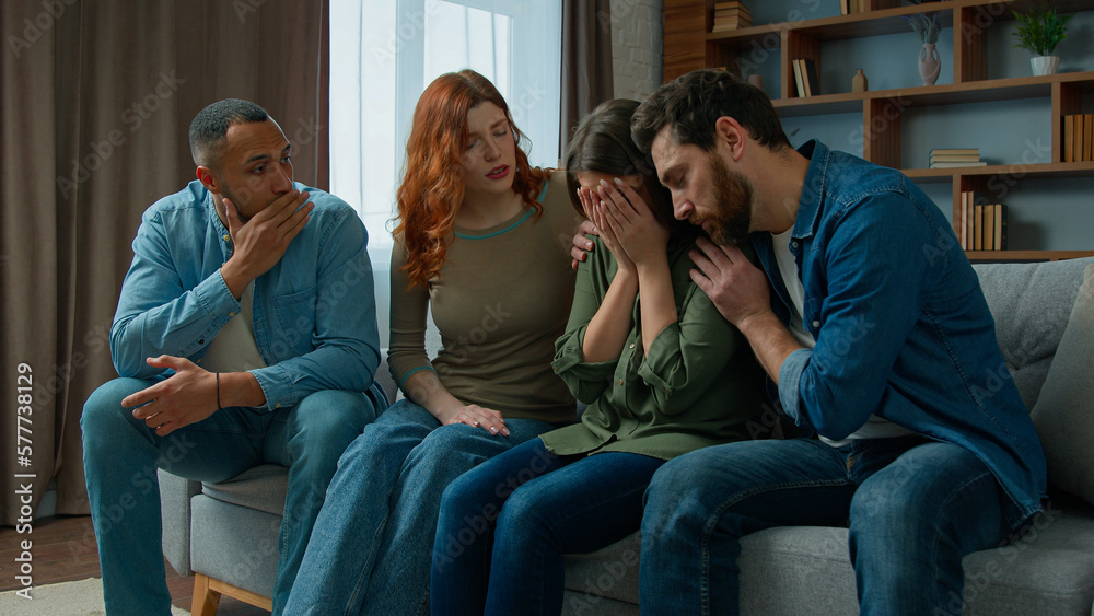 Multiracial 30s diverse people sit indoors sad crying woman sharing ...