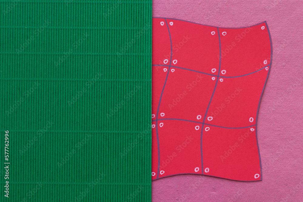 decorative paper background with corrugated green board, red paper with ...