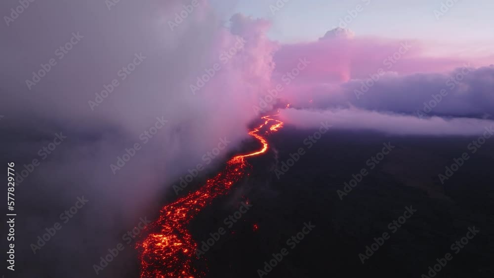 Magnificent lava river at active volcano eruption. Glowing hot red lava ...
