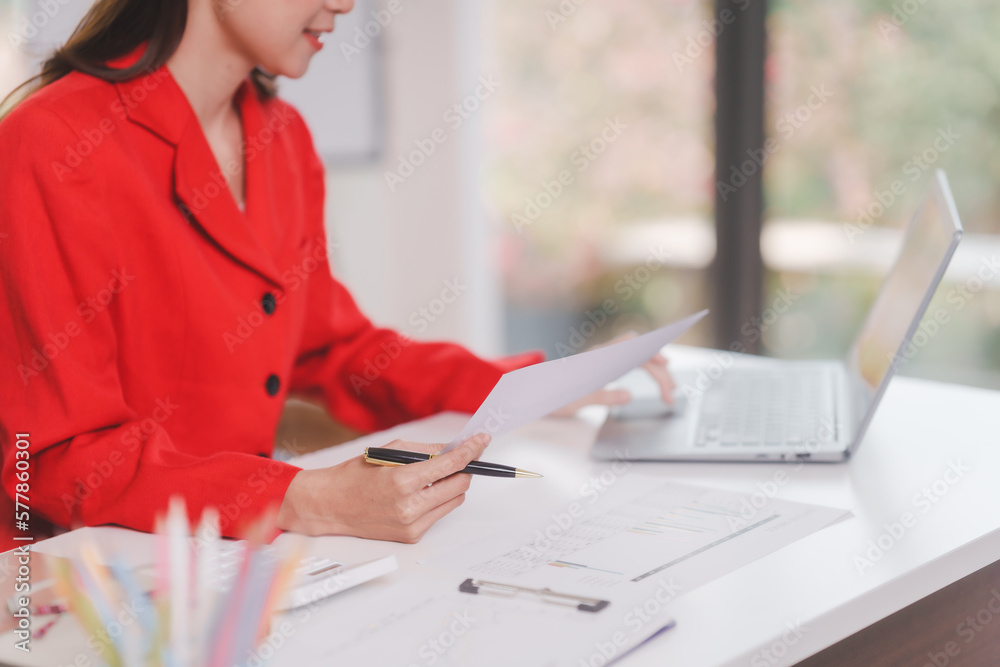 Female attractive asian banker accountant wearing red formal suit ...