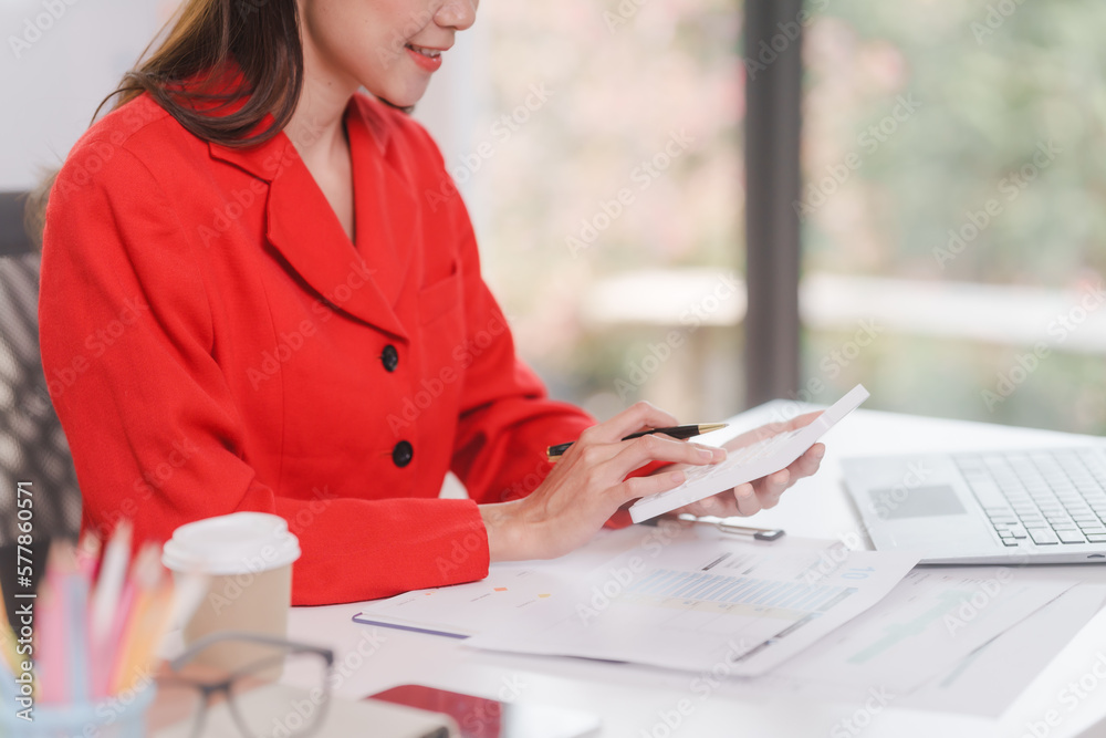 Female attractive asian banker accountant wearing red formal suit ...