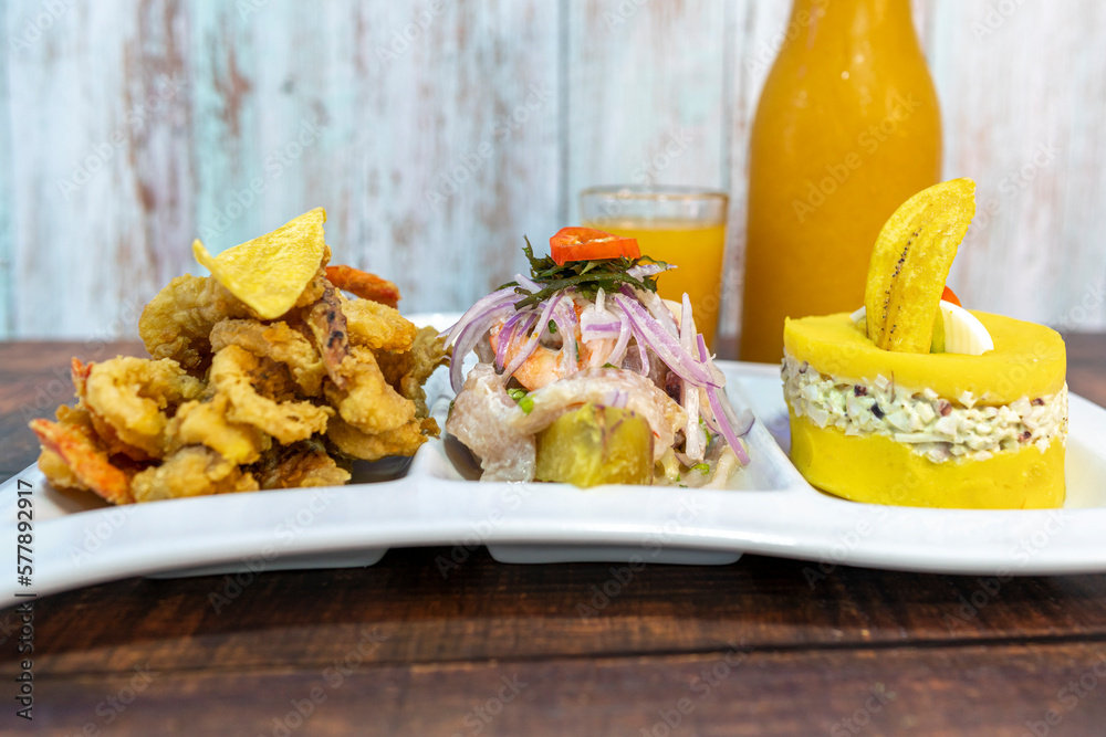 ceviche, chicharrón de pescado and causa de atún con maracuyá. peruvian ...