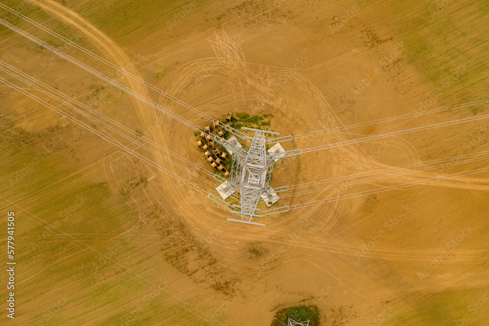 Drone top down view of high voltage electrical line and steel ...