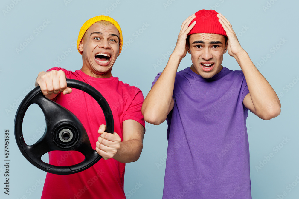 Young shocked scared sad confused fearful couple two friends men ...