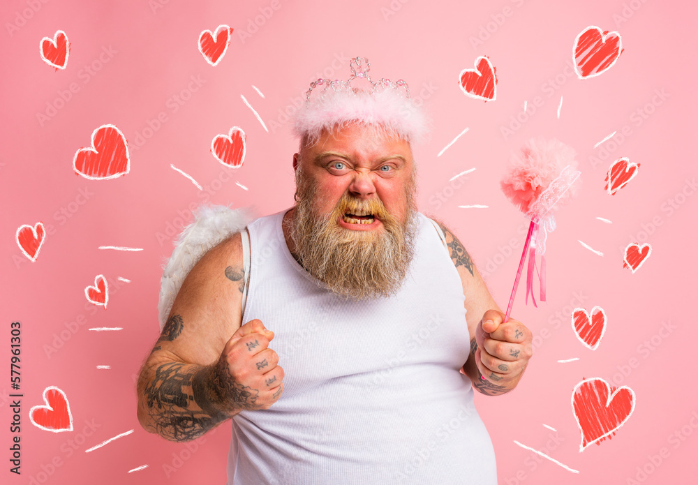 Fat angry man with tattoos acts like a magical fairy Stock Photo ...