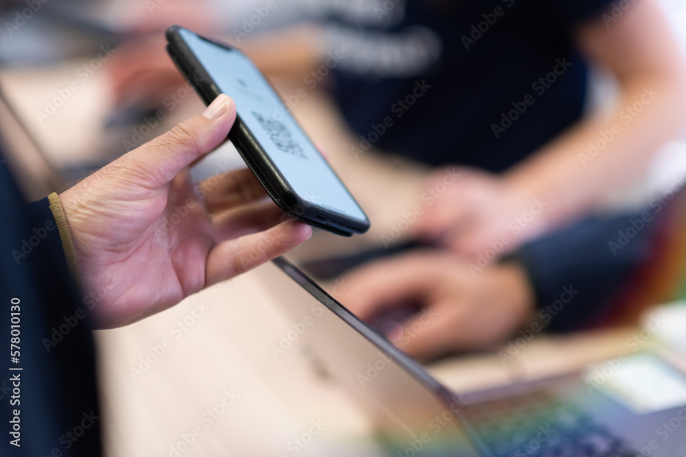 Event QR code ticket scanning. Businessman registering for a business ...