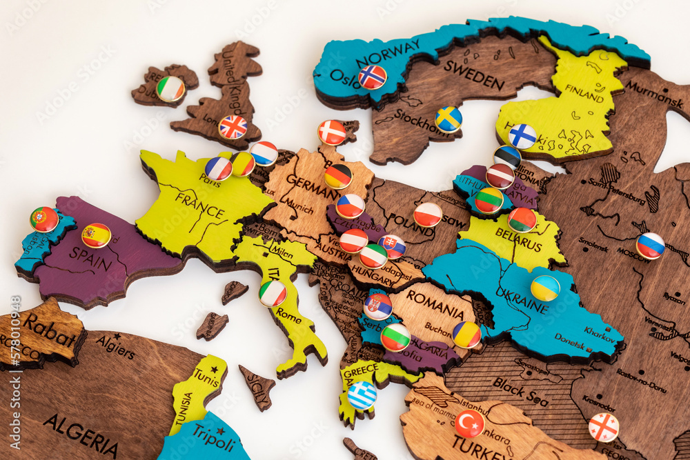 map of europe with flags, lots of round metal buttons with different ...