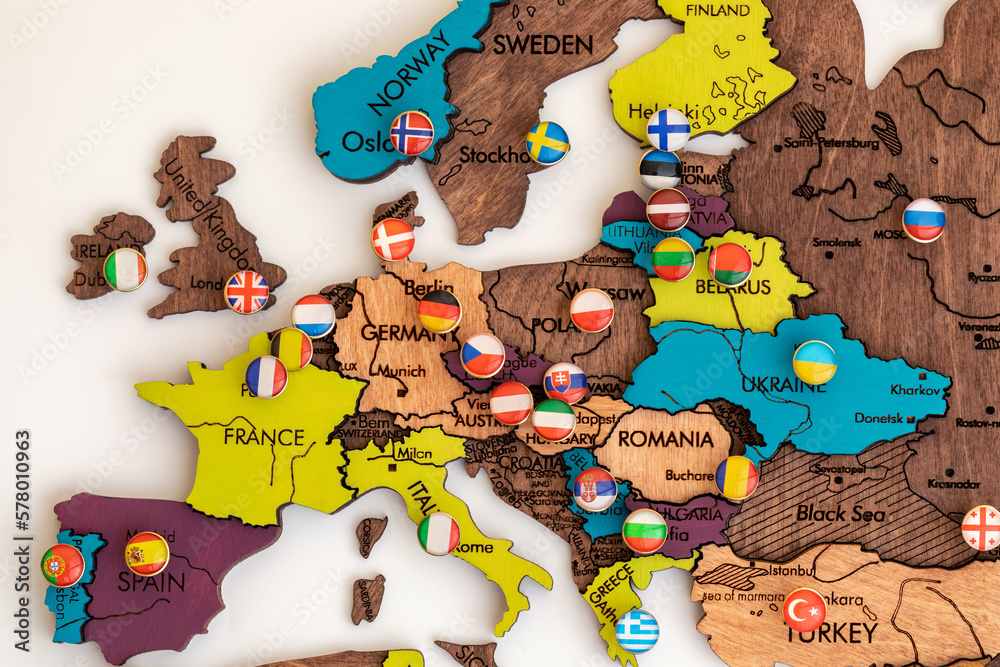 map of europe with flags, lots of round metal buttons with different ...
