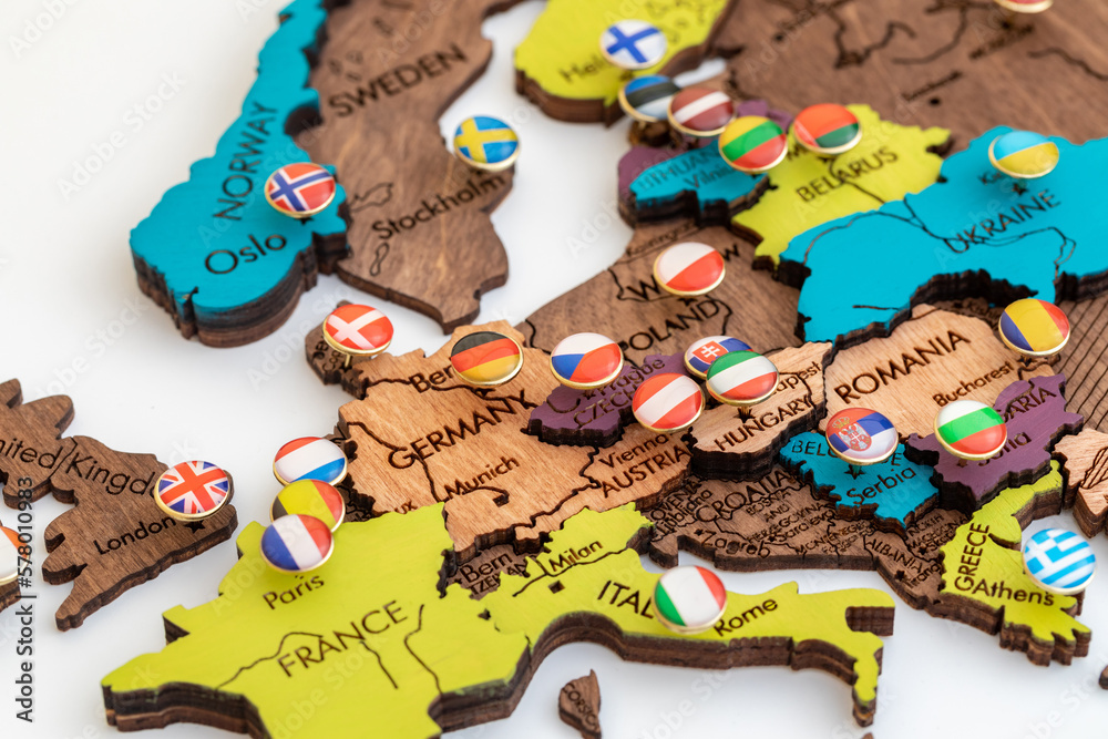 map of europe with flags, lots of round metal buttons with different ...