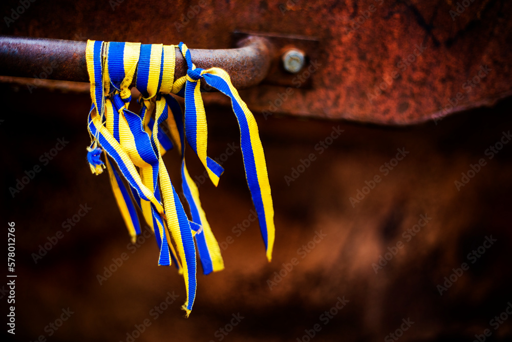 blue-yellow Ukrainian ribbons as a symbol tied to parts of military ...