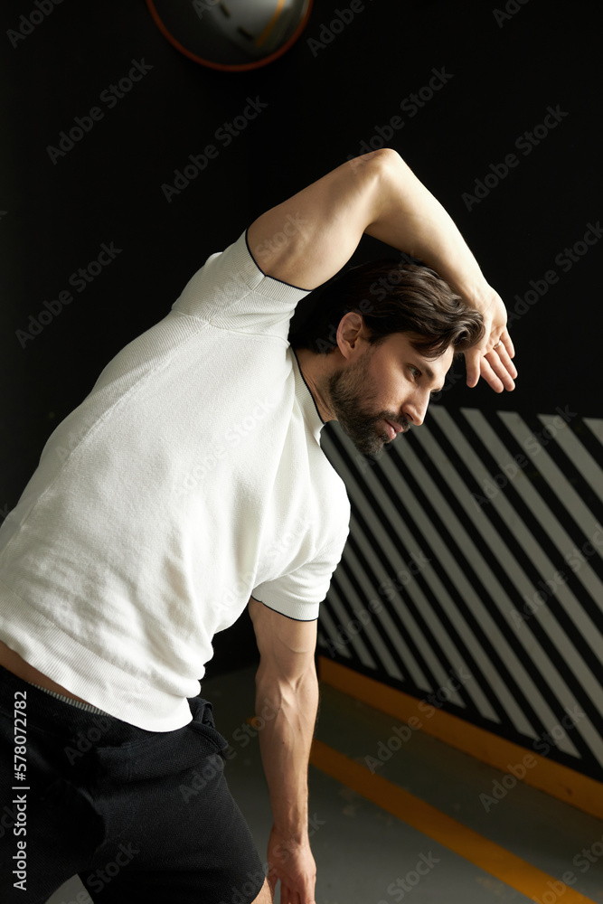 Closeup vertical image of brutal male athlete in white t-shirt ...