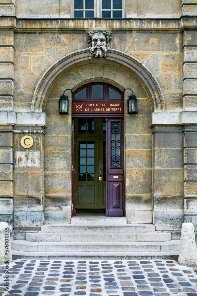 Paris ancient stone building entrance with wooden carved double doors ...