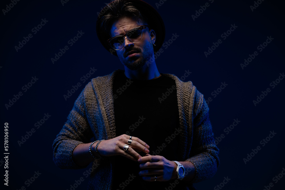 fashion model holding hands and posing with style Stock Photo | Adobe Stock