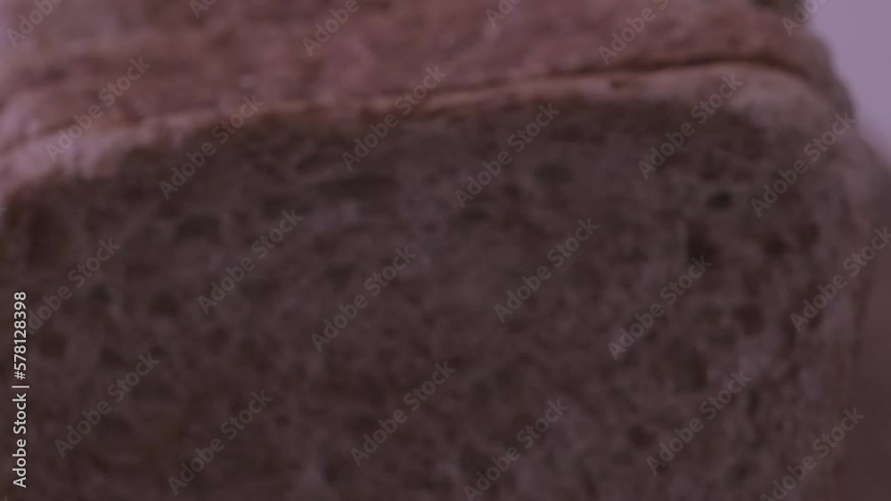 close-up toast appetizing fresh wholemeal bread with bran sliced in ...