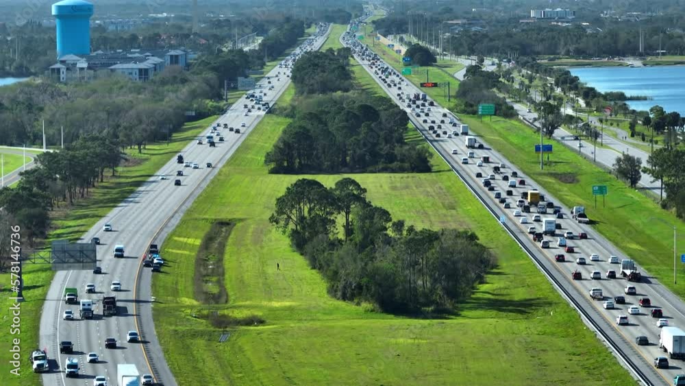 Aerial view of busy american highway with heavy fast moving traffic in ...