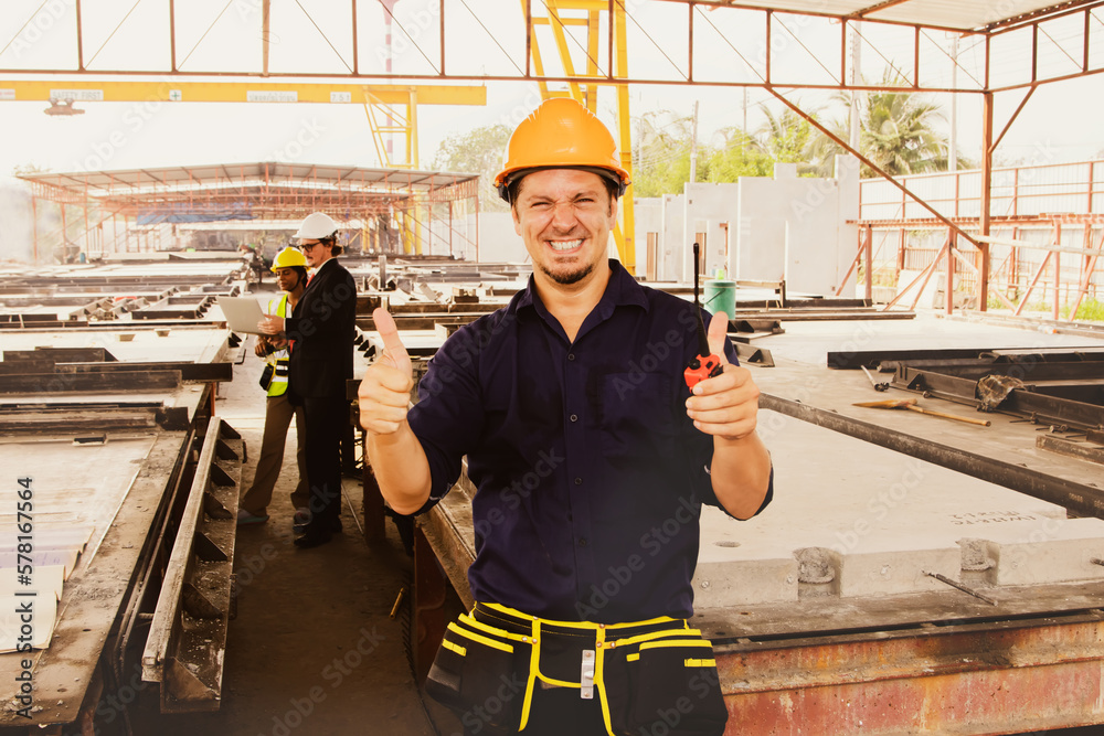 Male plasterer worker craftsman in factory construction site precast ...