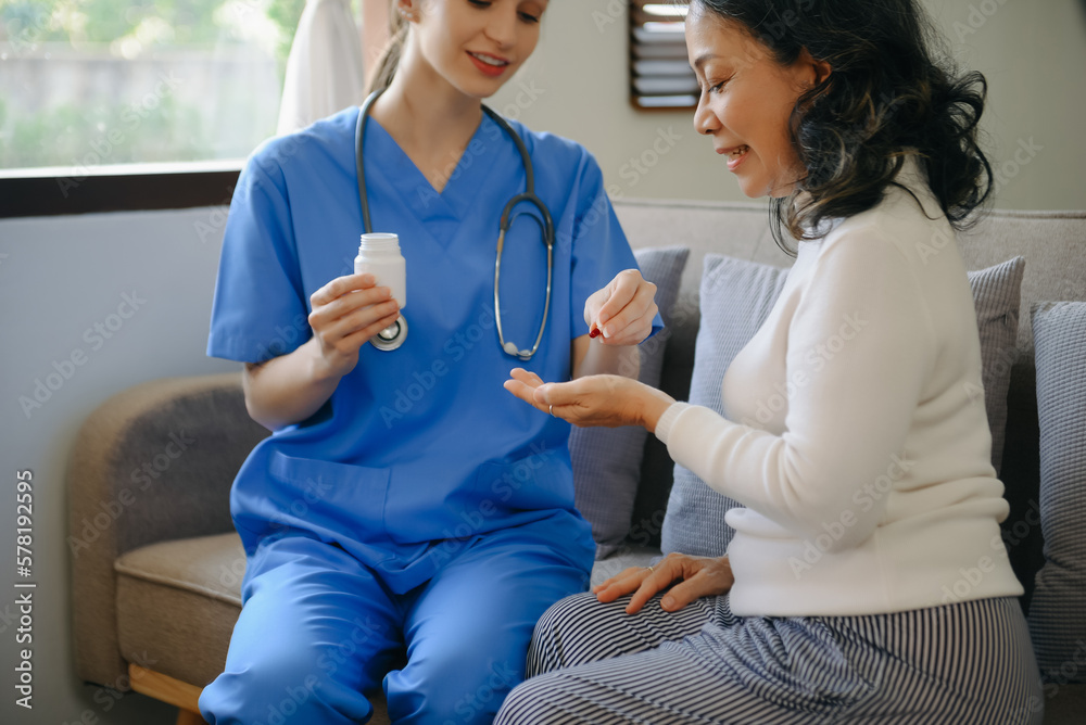 medical doctor holing patient's hands and comforting her.Kind doctor ...