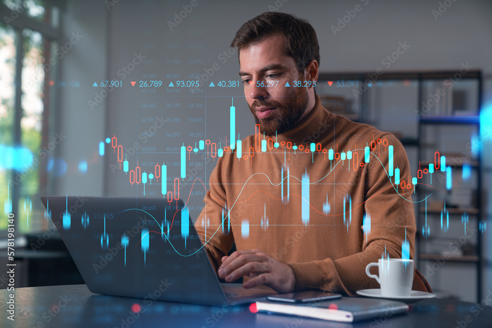 Thoughtful businessman trader in casual wear looking at charts and ...