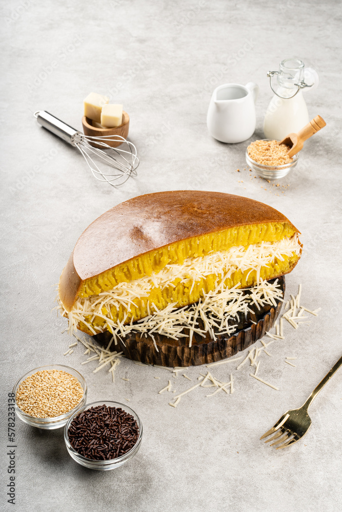 Martabak manis or terang bulan is indonesian sweet pancake, with yellow ...