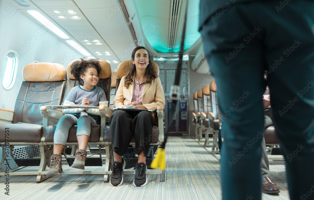 Flight attendants show how to use safety devices and recommend ...