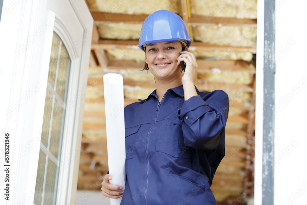 woman builder standing in construction site Stock Photo | Adobe Stock