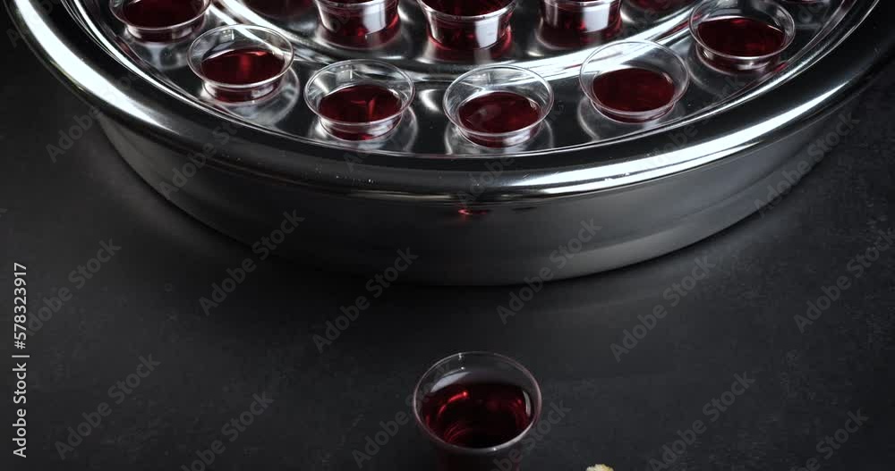 Communion glass cups on tray filled with wine the symbol of Jesus ...