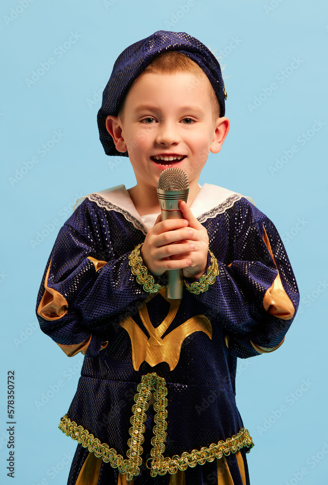 Happy preschool age boy in costume of medieval pageboy, little prince ...