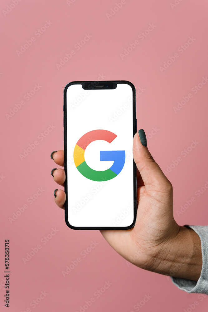 Mobile phone with the Google Logo on the screen Stock Photo | Adobe Stock