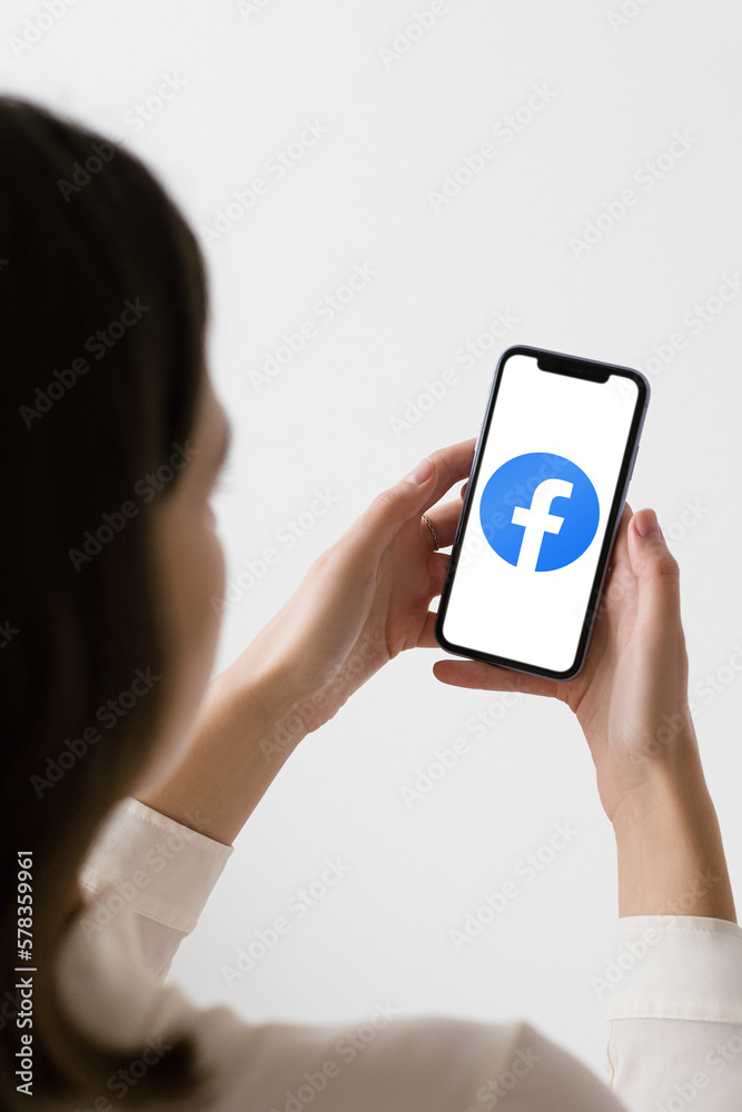 Mobile phone with the Facebook Logo on the screen ภาพถ่ายสต็อก | Adobe ...