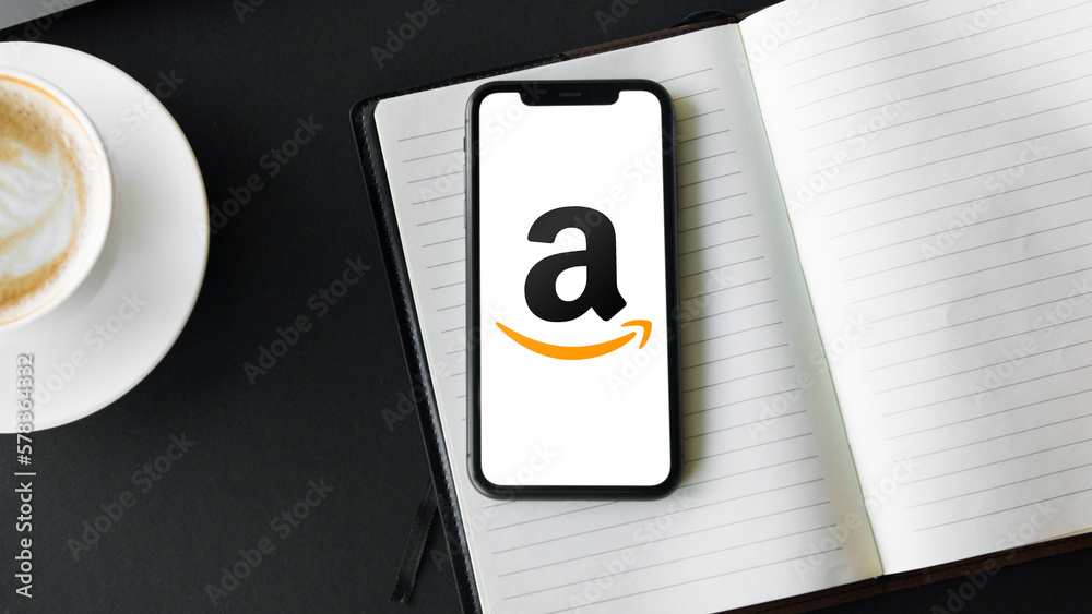 Mobile phone with the Amazon Logo on the screen Stock Photo | Adobe Stock