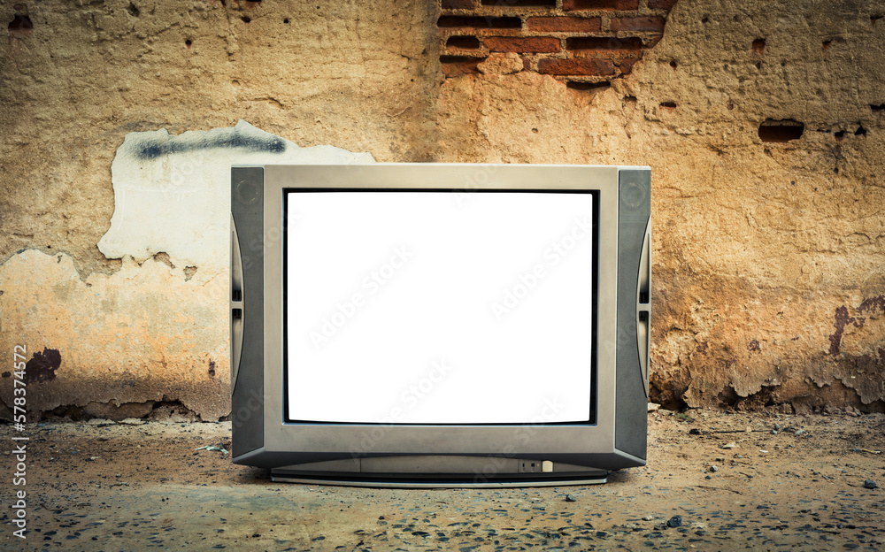 Retro old televisions cut out screen in front of old wall background ...