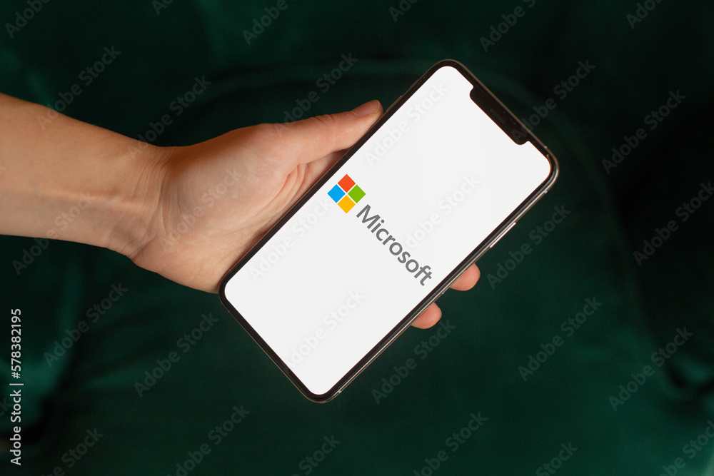 Mobile phone with the Microsoft Logo on the screen Stock Photo | Adobe ...
