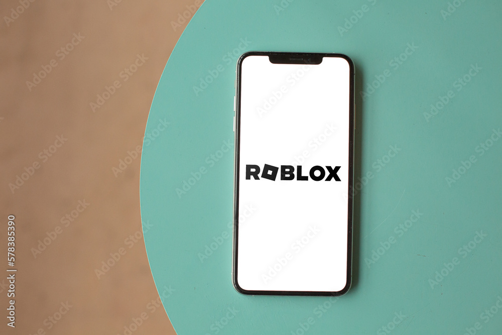 Mobile phone with the Roblox Logo on the screen Stock Photo | Adobe Stock