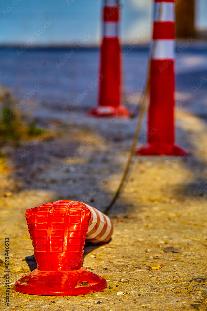 Crushed or broken white and red Paletti flessibili. flexible boundary ...