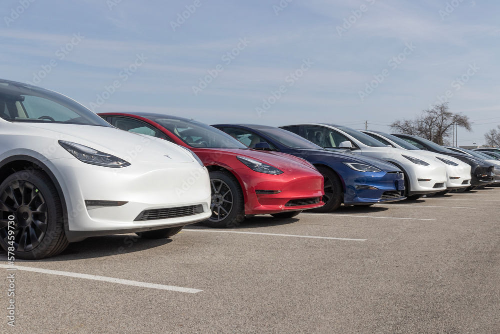 Tesla EV electric vehicles on display. Tesla products include electric ...